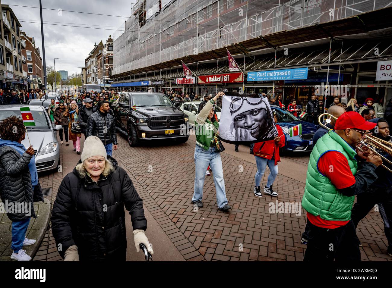 ROTTERDAM - The body of rapper Def Rhymz is driven around during a ...