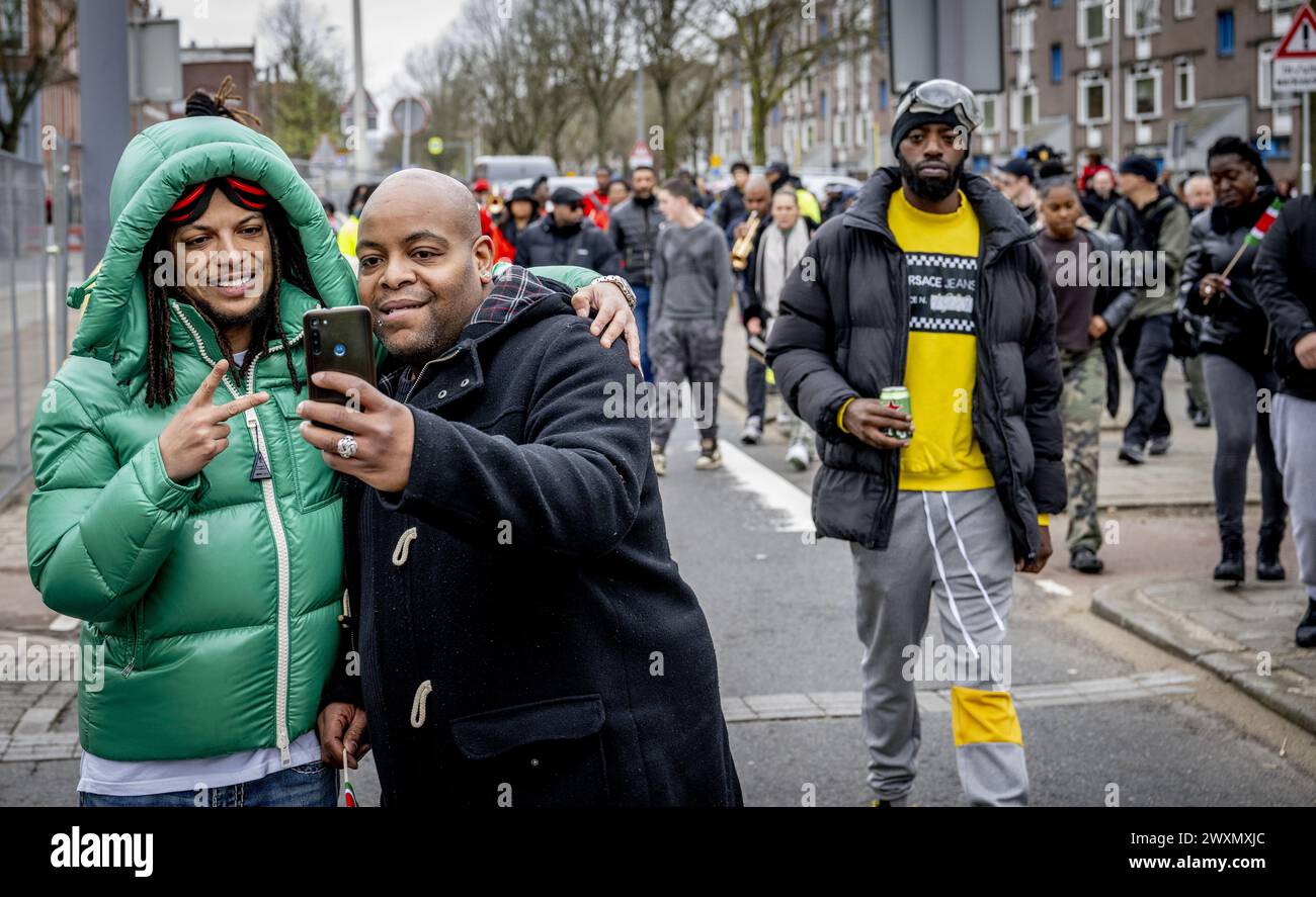 ROTTERDAM - Ronnie Flex during a funeral procession for the deceased ...