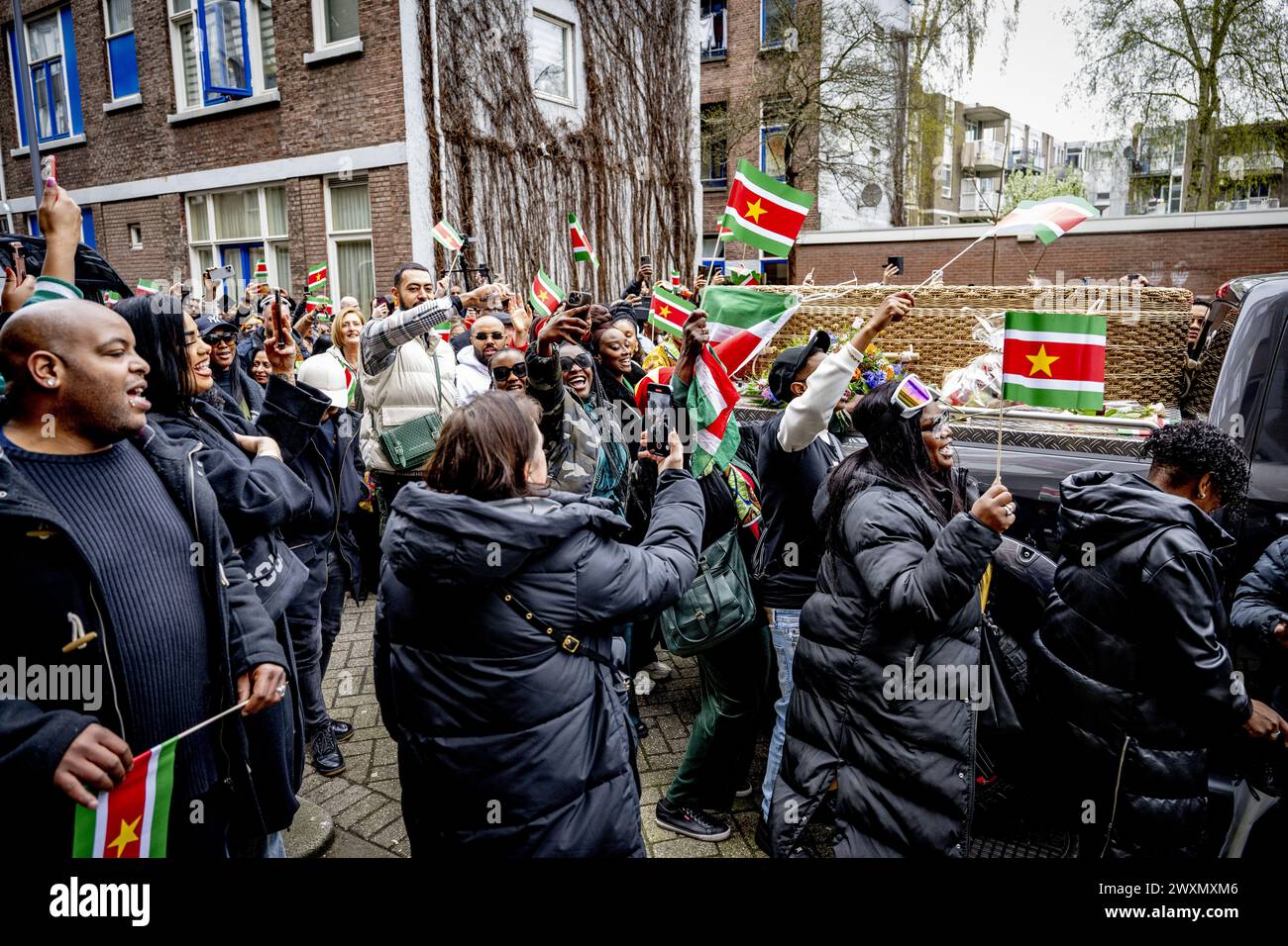 ROTTERDAM - The body of rapper Def Rhymz is driven around during a ...