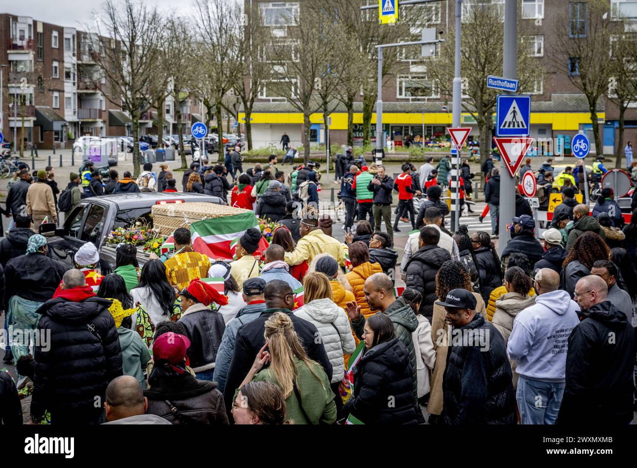 ROTTERDAM - The body of rapper Def Rhymz is driven around during a ...