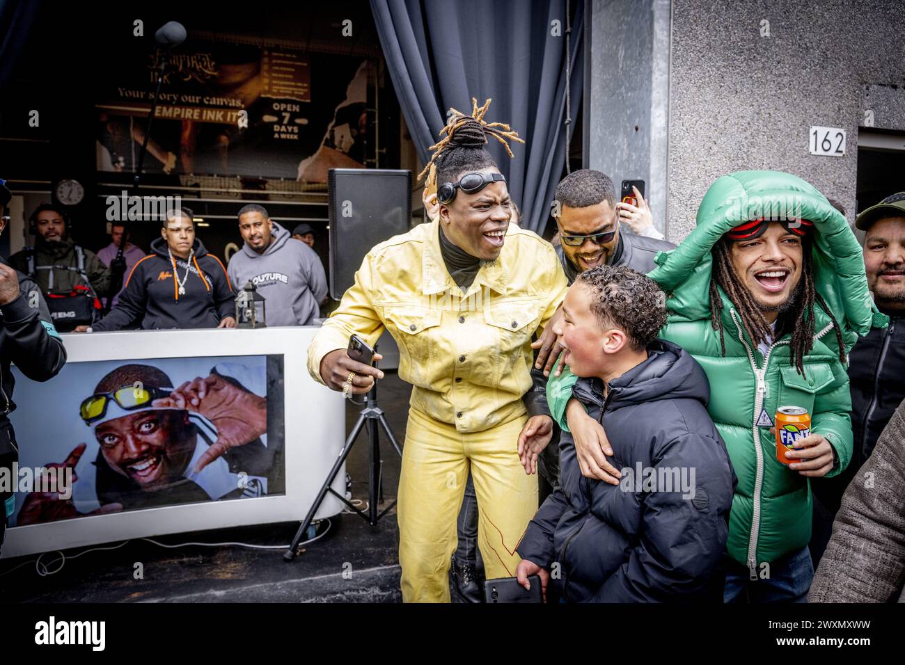 ROTTERDAM - Ronnie Flex during a funeral procession for the deceased ...