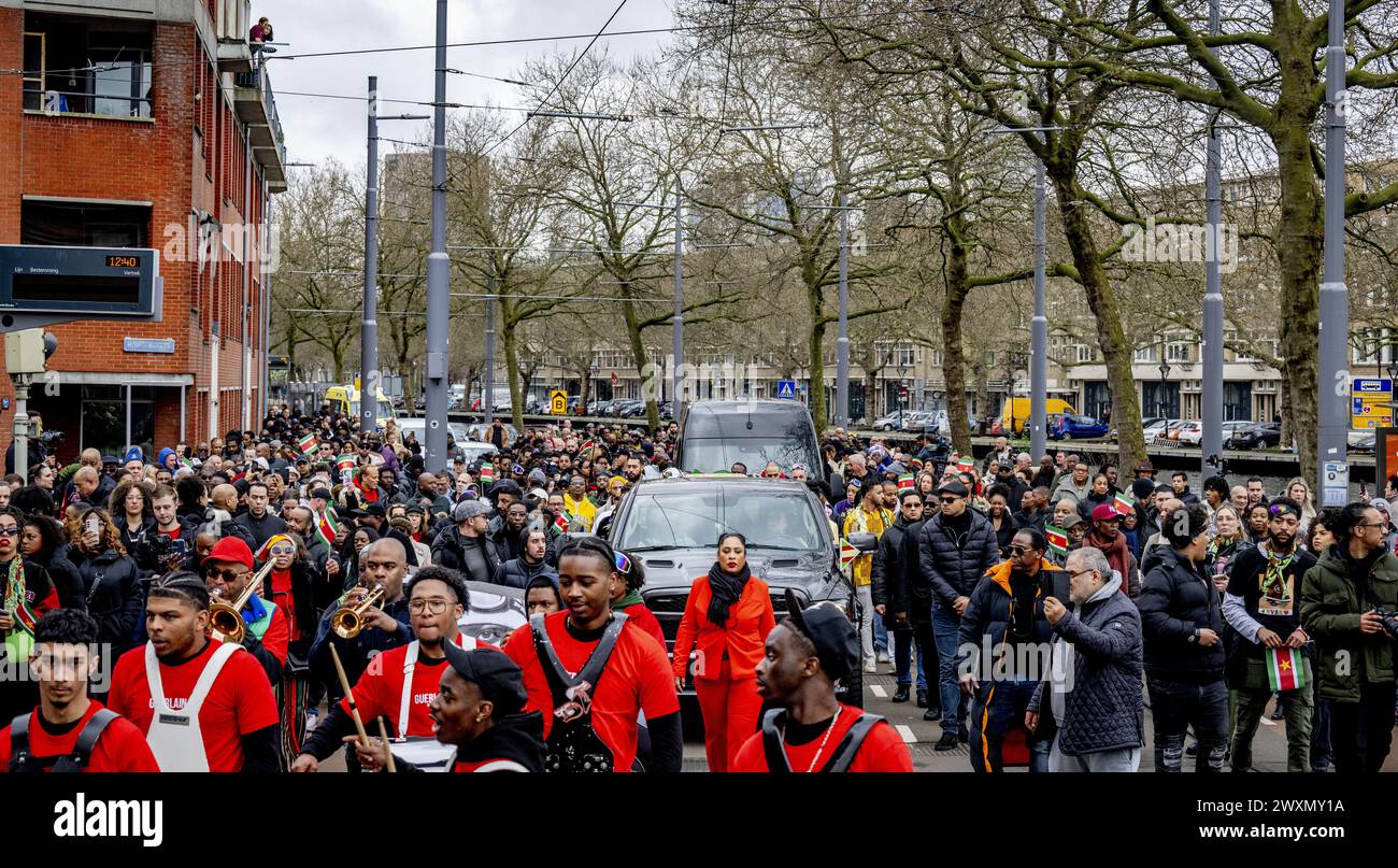 ROTTERDAM - The body of rapper Def Rhymz is driven around during a ...