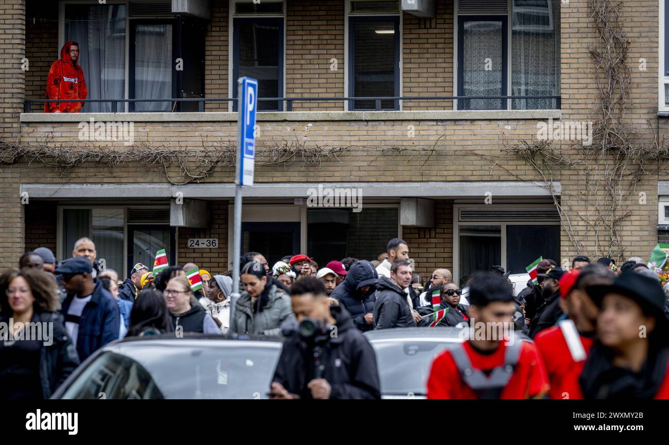 ROTTERDAM - The body of rapper Def Rhymz is driven around during a ...