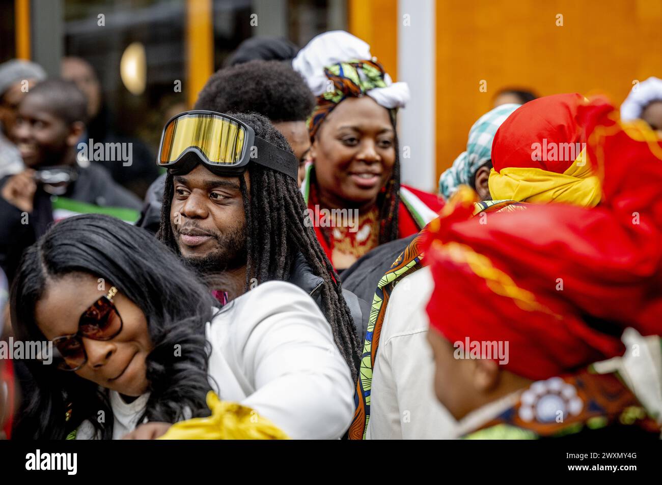 ROTTERDAM - The body of rapper Def Rhymz is driven around during a ...