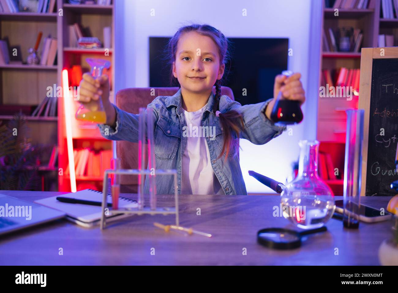 Preschool child performing experiment of learning and education Stock ...