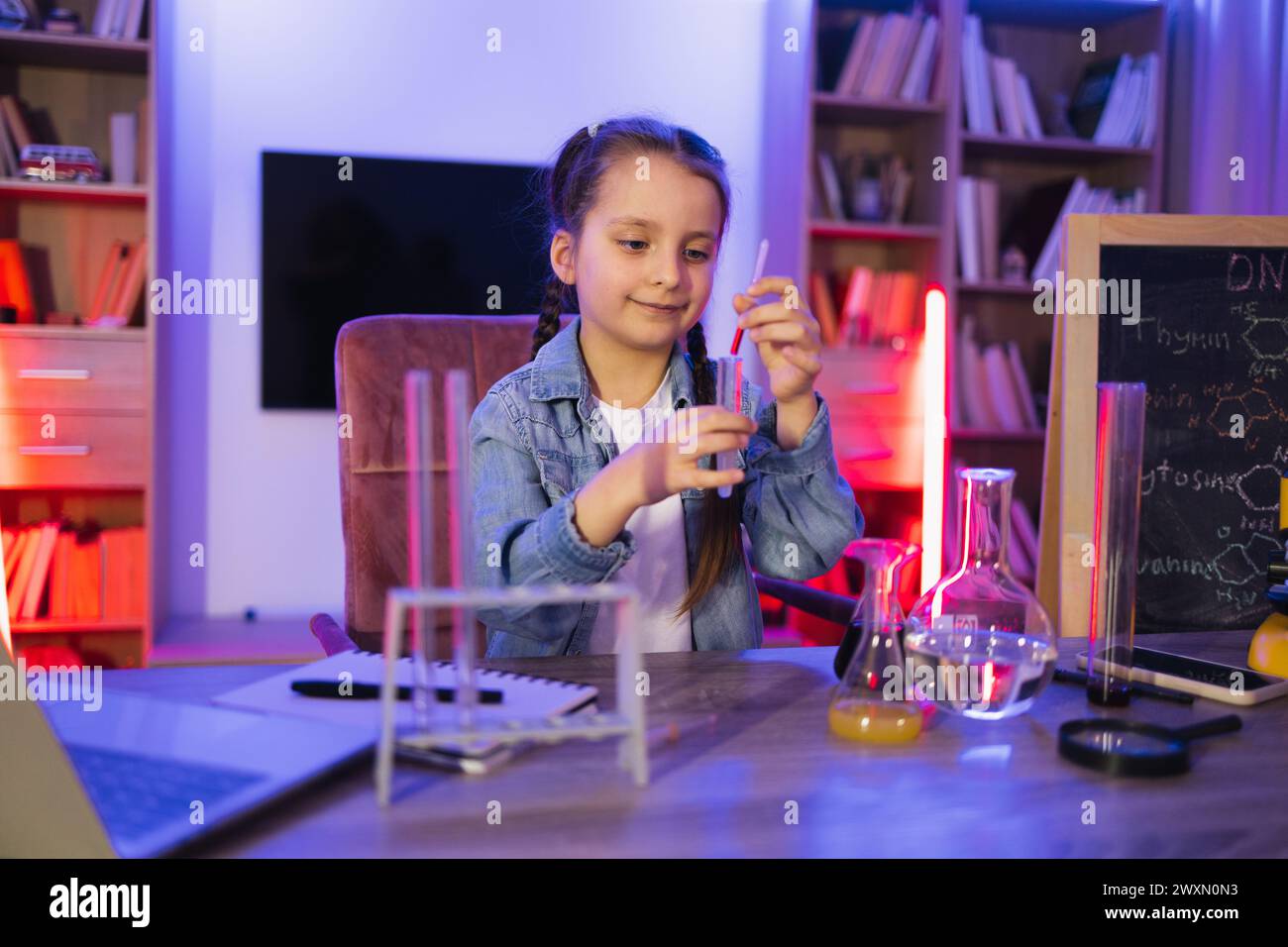 Preschool child performing experiment of learning and education Stock ...