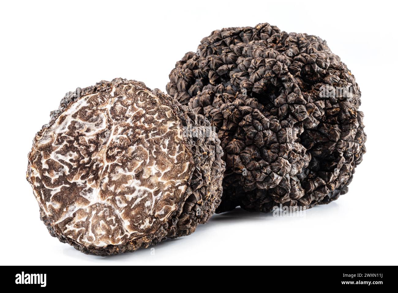 Summer truffles and truffle slices isolated on white background. Close ...