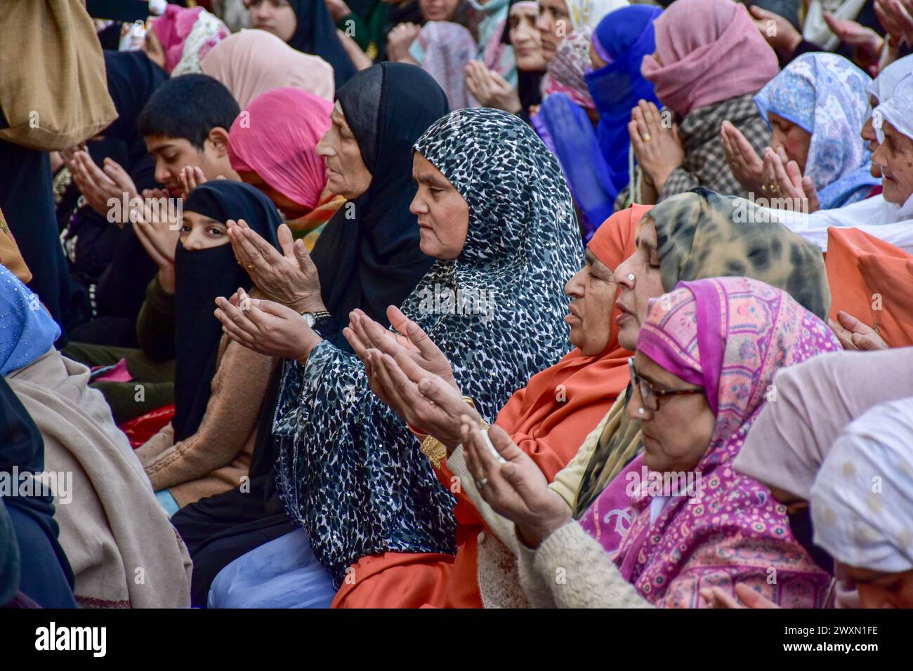 Srinagar, India. 01st Apr, 2024. Kashmiri Muslim devotees pray at the ...