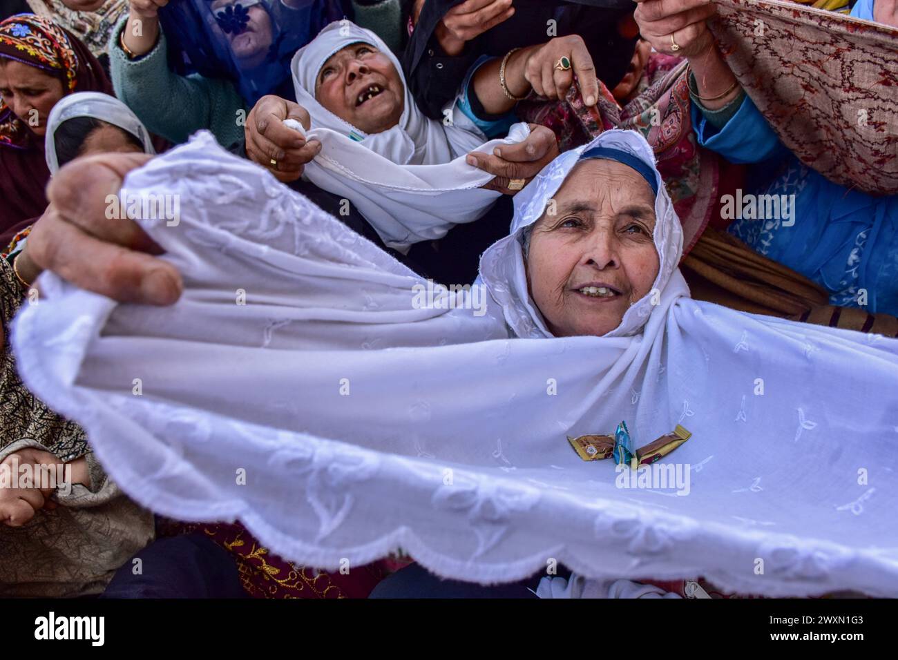 Srinagar, India. 01st Apr, 2024. Kashmiri Muslim devotees pray as a ...