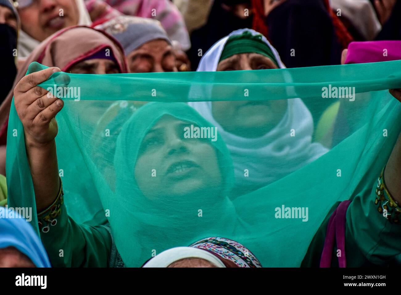 Srinagar, India. 01st Apr, 2024. A Kashmiri Muslim devotee prays at the ...