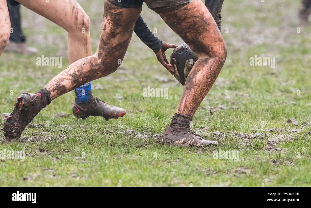 Playing rugby in mud hi-res stock photography and images - Alamy