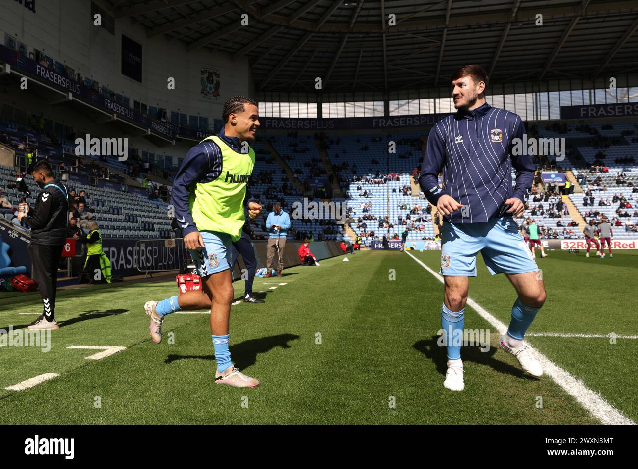 Coventry City players run onto the pitch for a warm up before the Sky ...