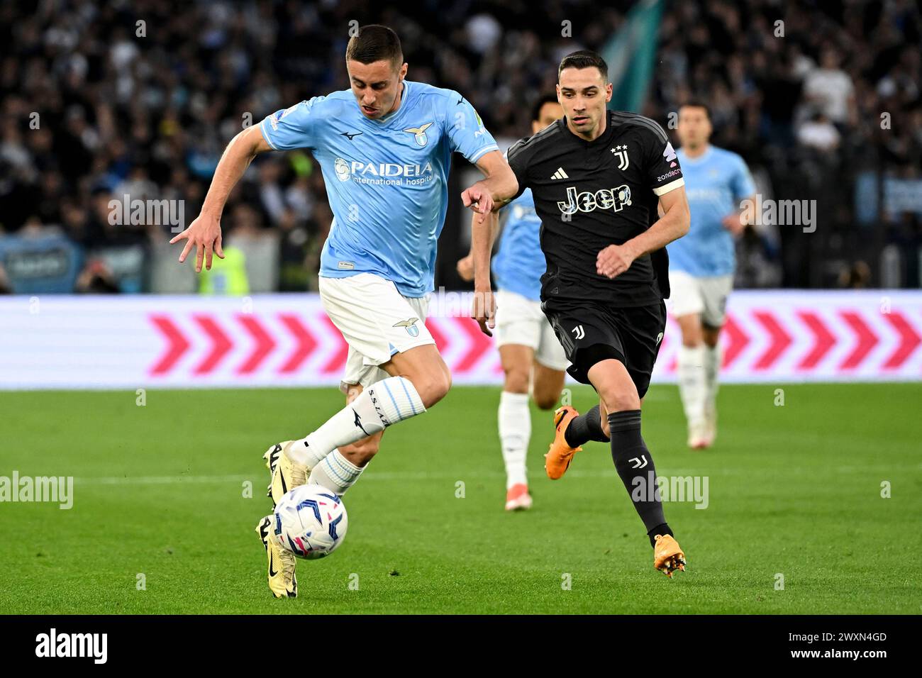 Adam Marusic of SS Lazio and Mattia De Sciglio of Juventus FC during ...