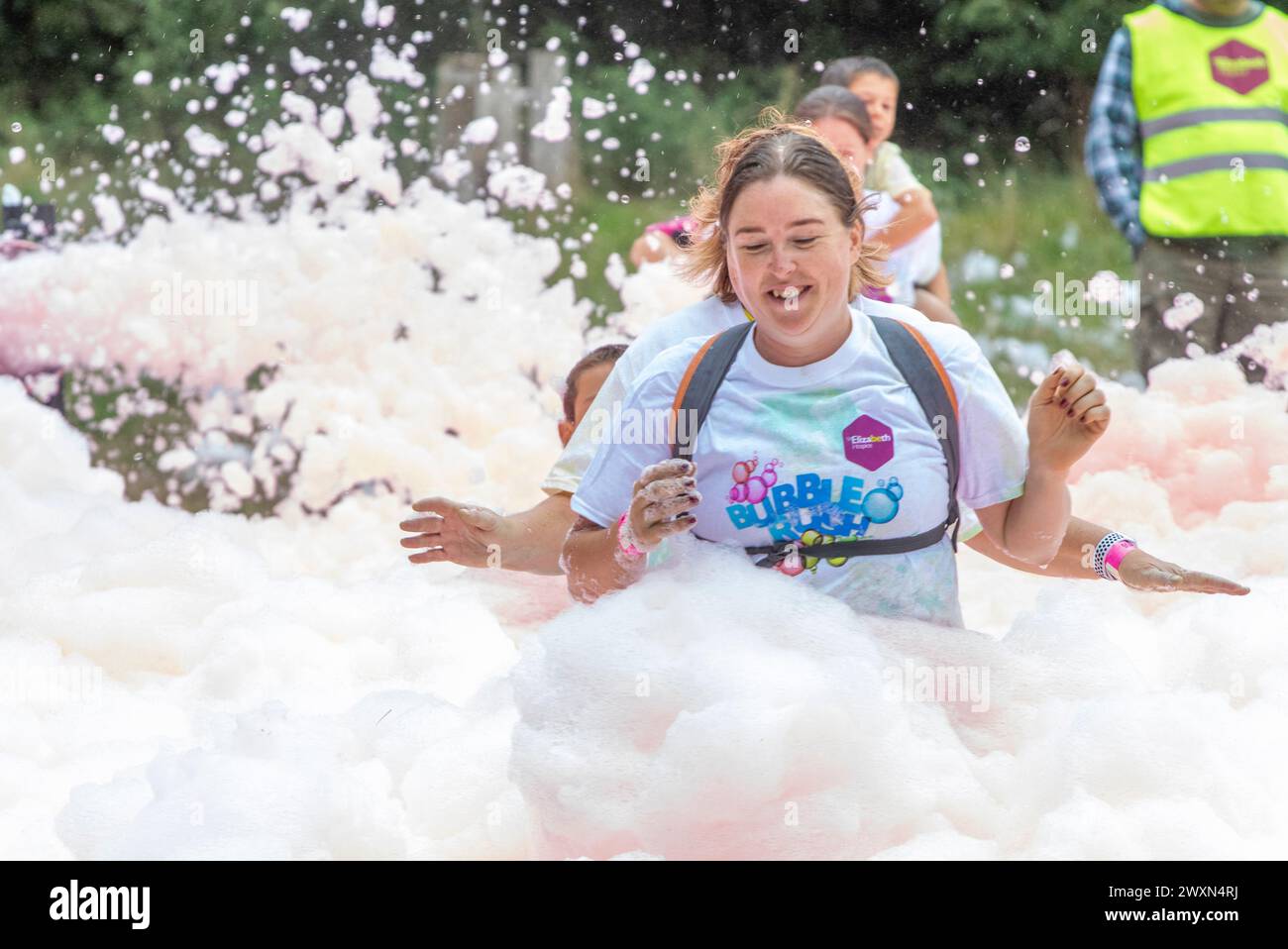 East Anglia Childrens Hospices (EACH) charity fundraiser Bubble Rush where fun seekers run, jog ...