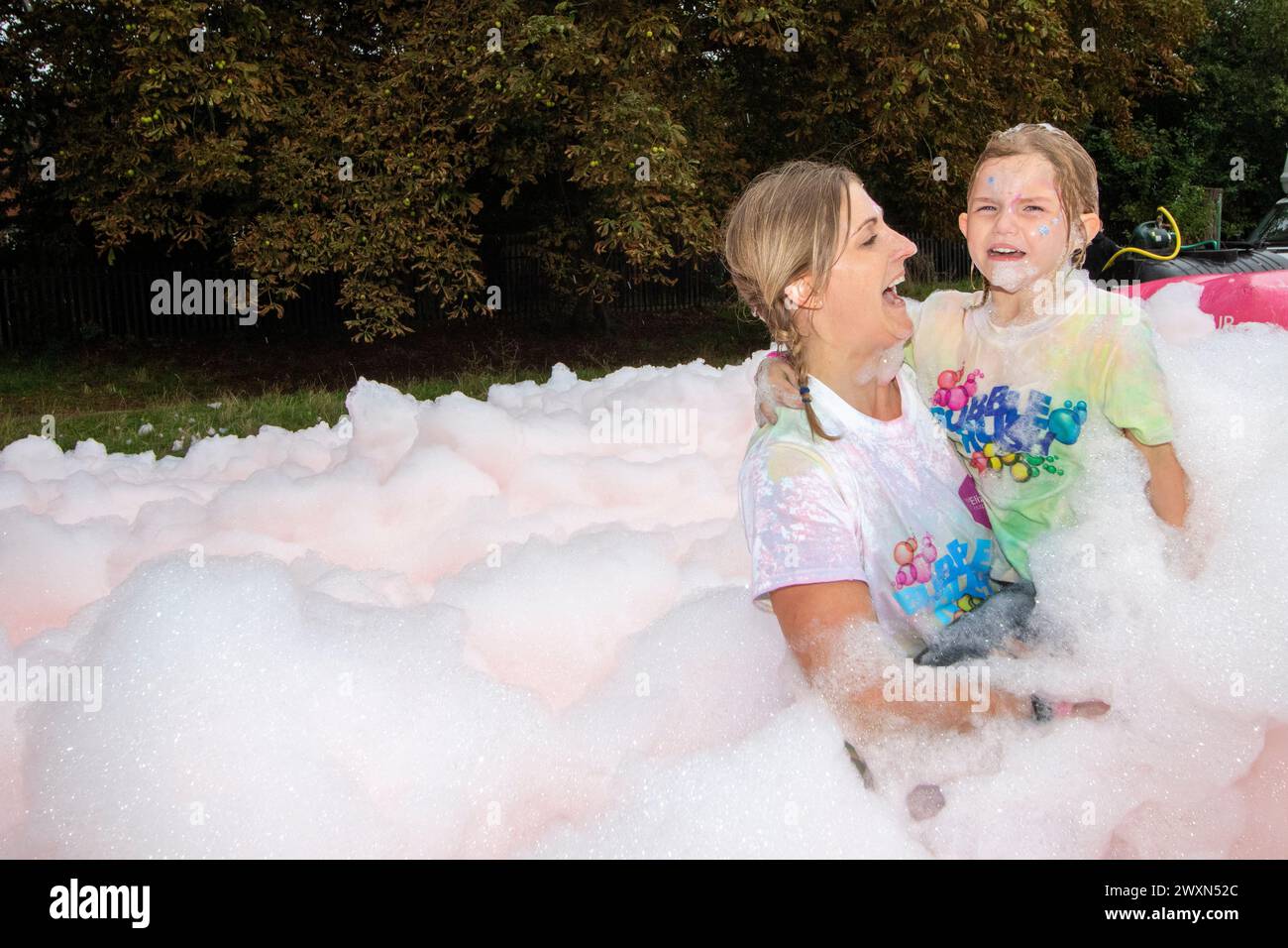 East Anglia Childrens Hospices (EACH) charity fundraiser Bubble Rush where fun seekers run, jog ...