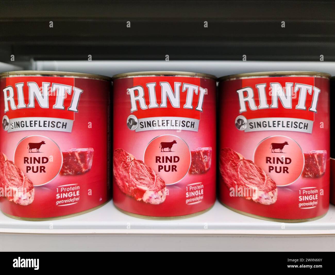 Kiel, Germany - 01. April 2024: Tins of Rinti brand meat dog food on a ...