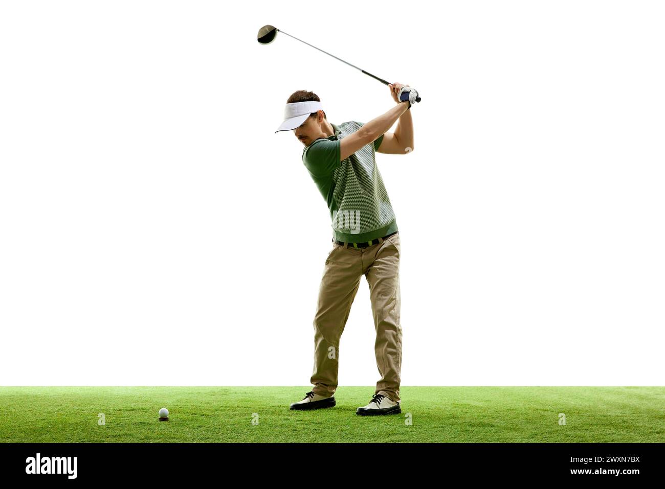 Full length portrait of golfer hitting golf shot with club on course ...