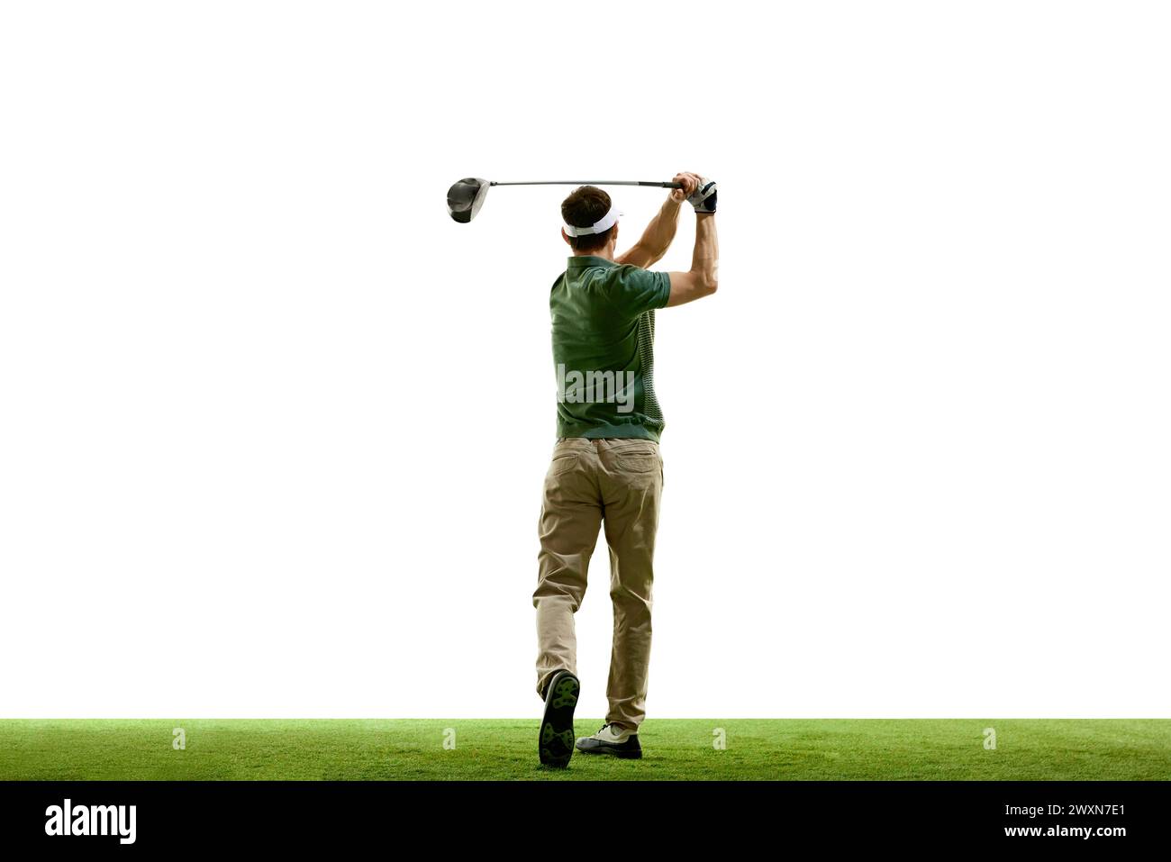 back view portrait of golfer in retro outfit with golf club taking shot ...
