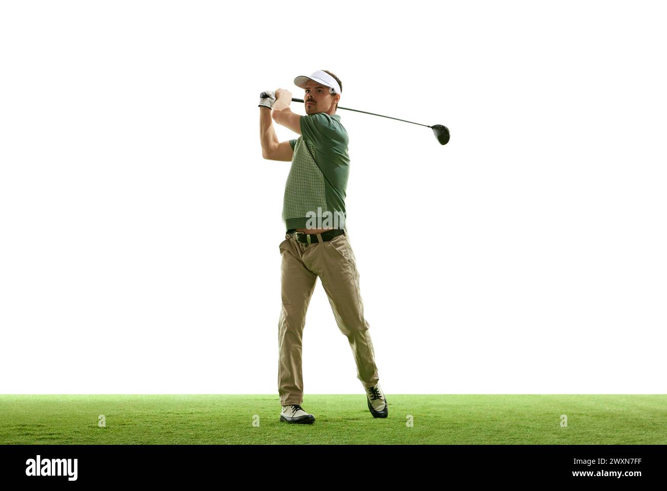 Full-body portrait of male golfer, skilled golf player performing tee ...