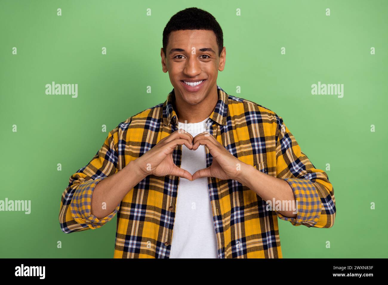 Photo of nice friendly person toothy smile arms fingers demonstrate ...