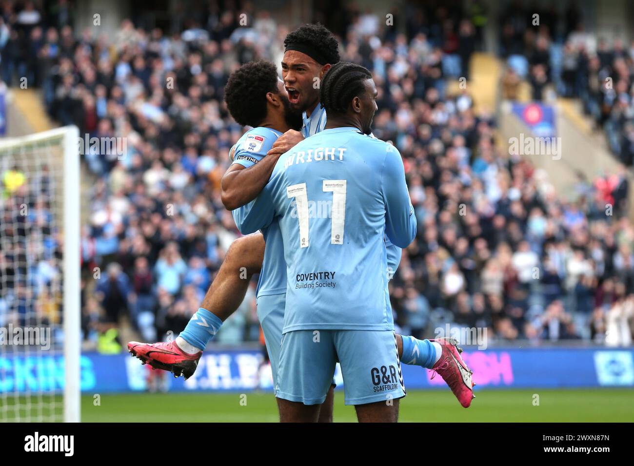 Coventry City's Ellis Simms (left) celebrates scoring their side's ...