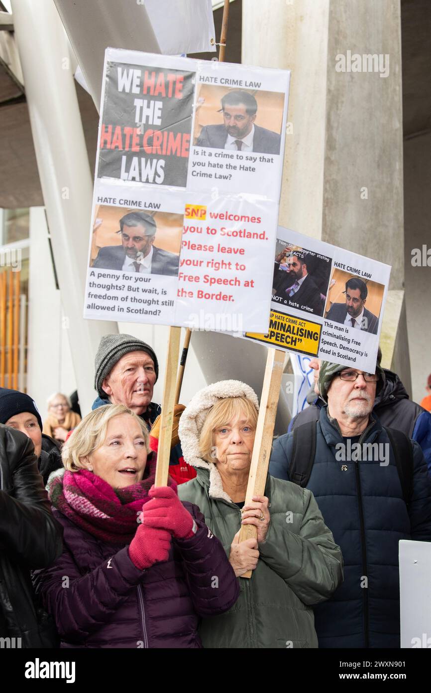 Campaigners gather outside the Scottish Parliament at Holyrood in ...