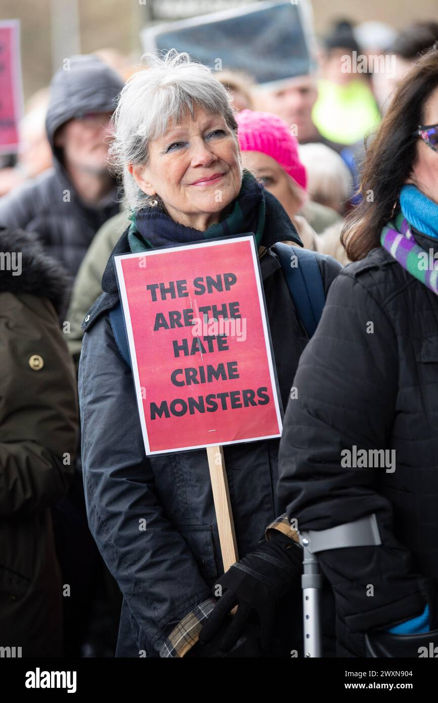 Campaigners gather outside the Scottish Parliament at Holyrood in ...