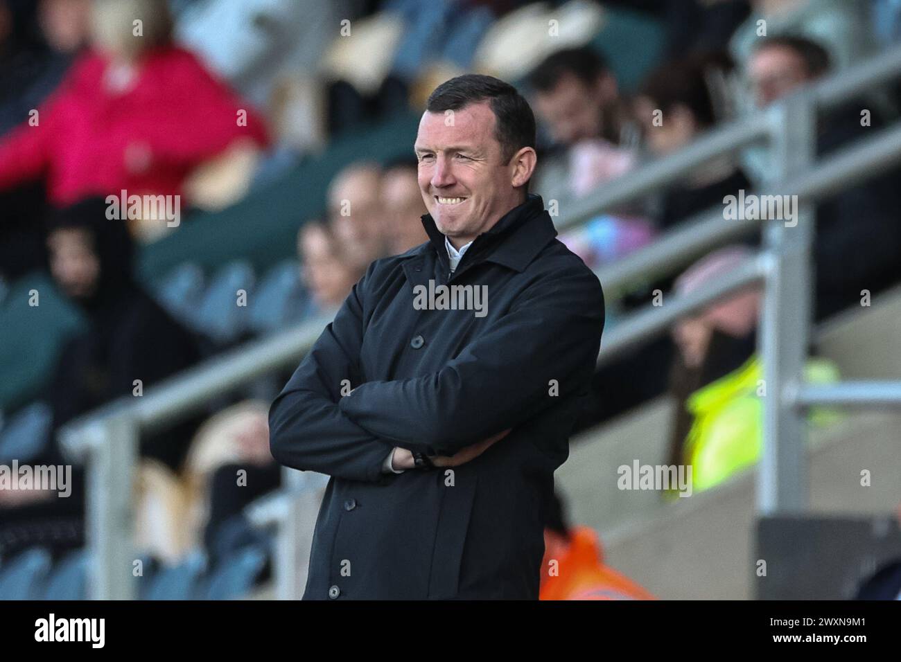 Neill Collins Head coach of Barnsley looks on as they trail 1-0 during ...