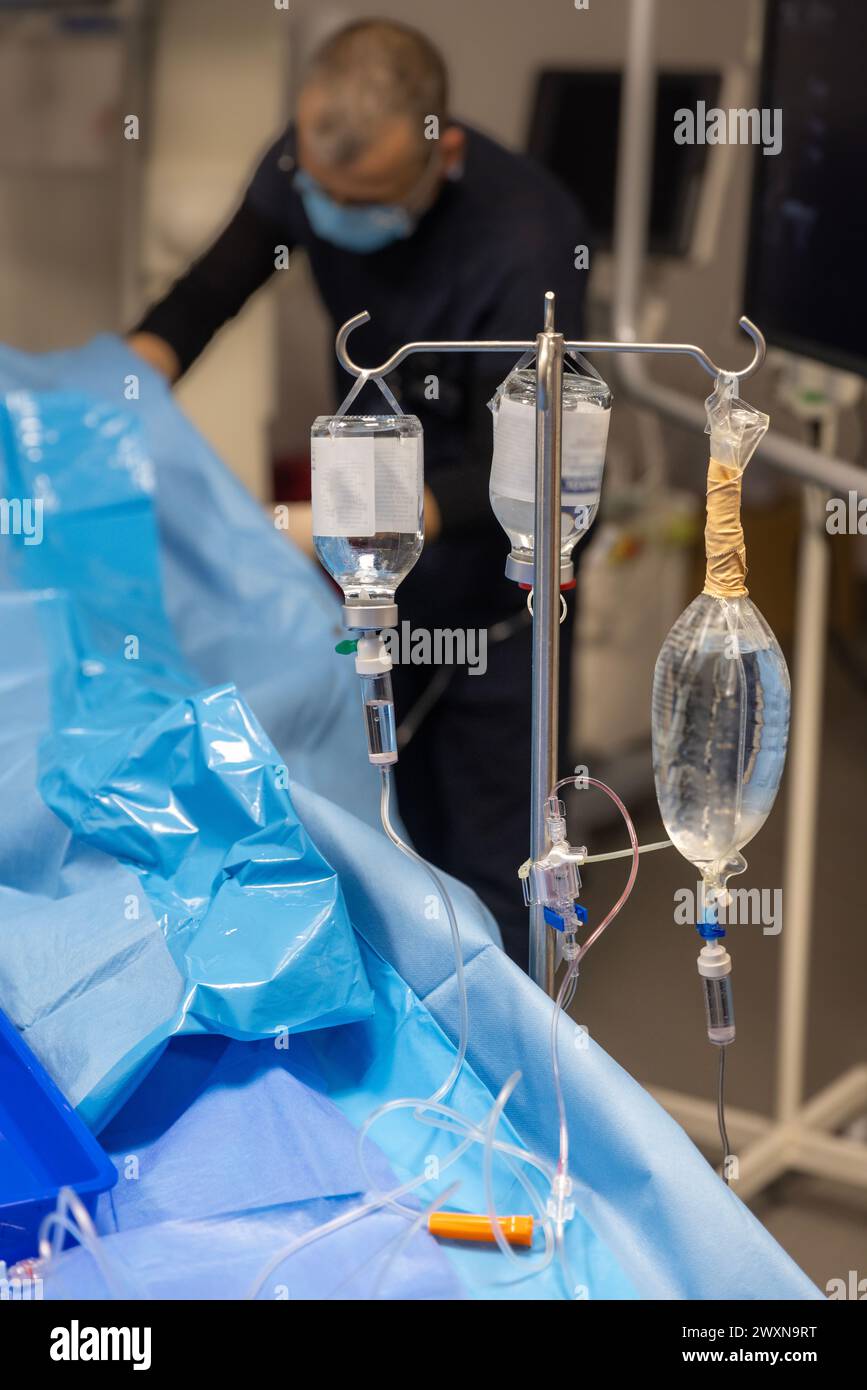 Serum is given to the patient in the operating room. the patient is ...