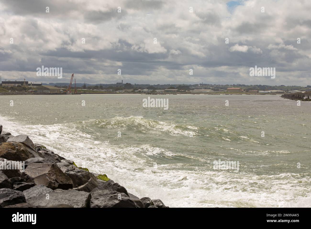 The Whanganui river where it empties into the Pacific. The 200 km river ...