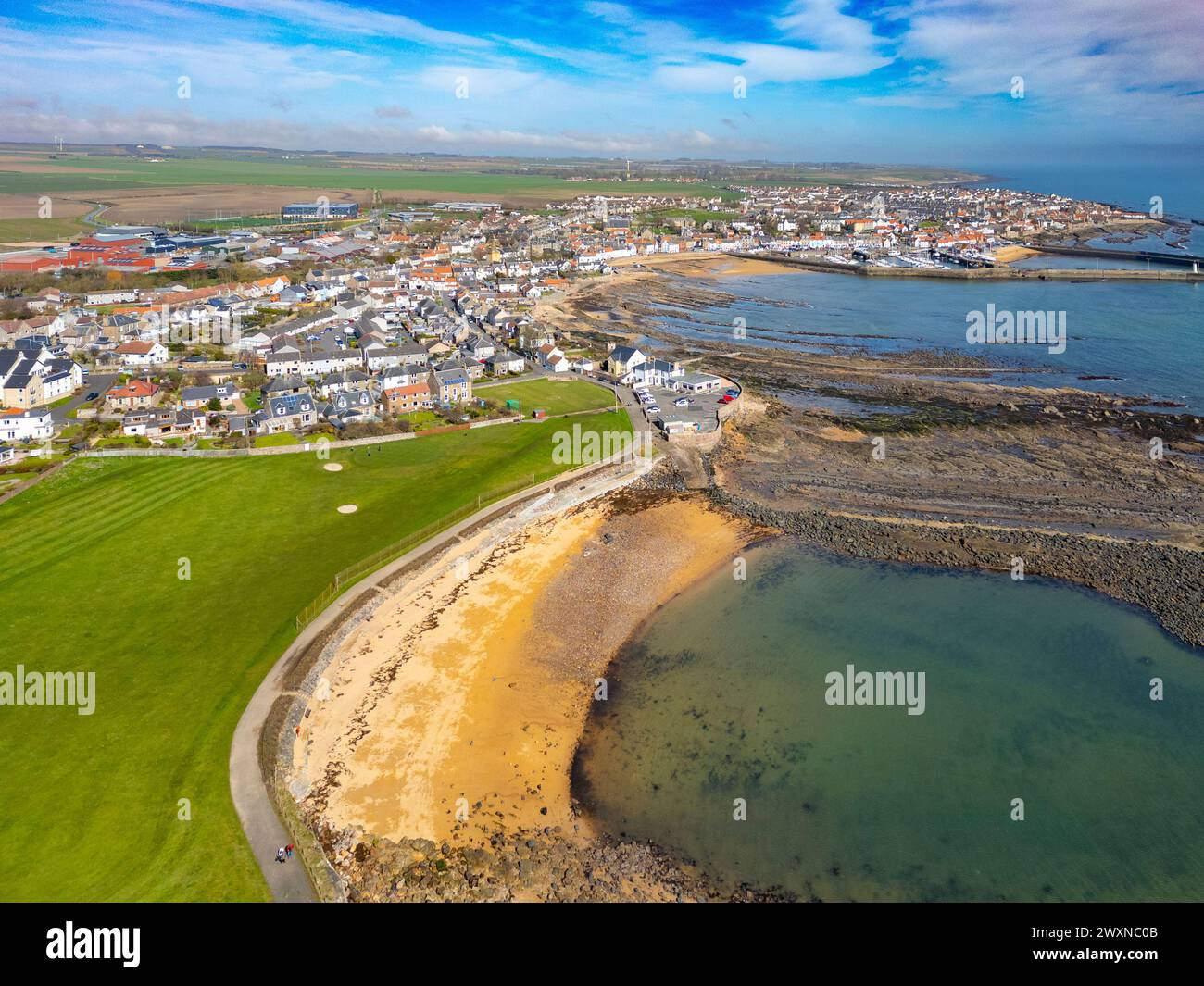 Aerial view of golf course and village of Anstruther in East Neuk of ...