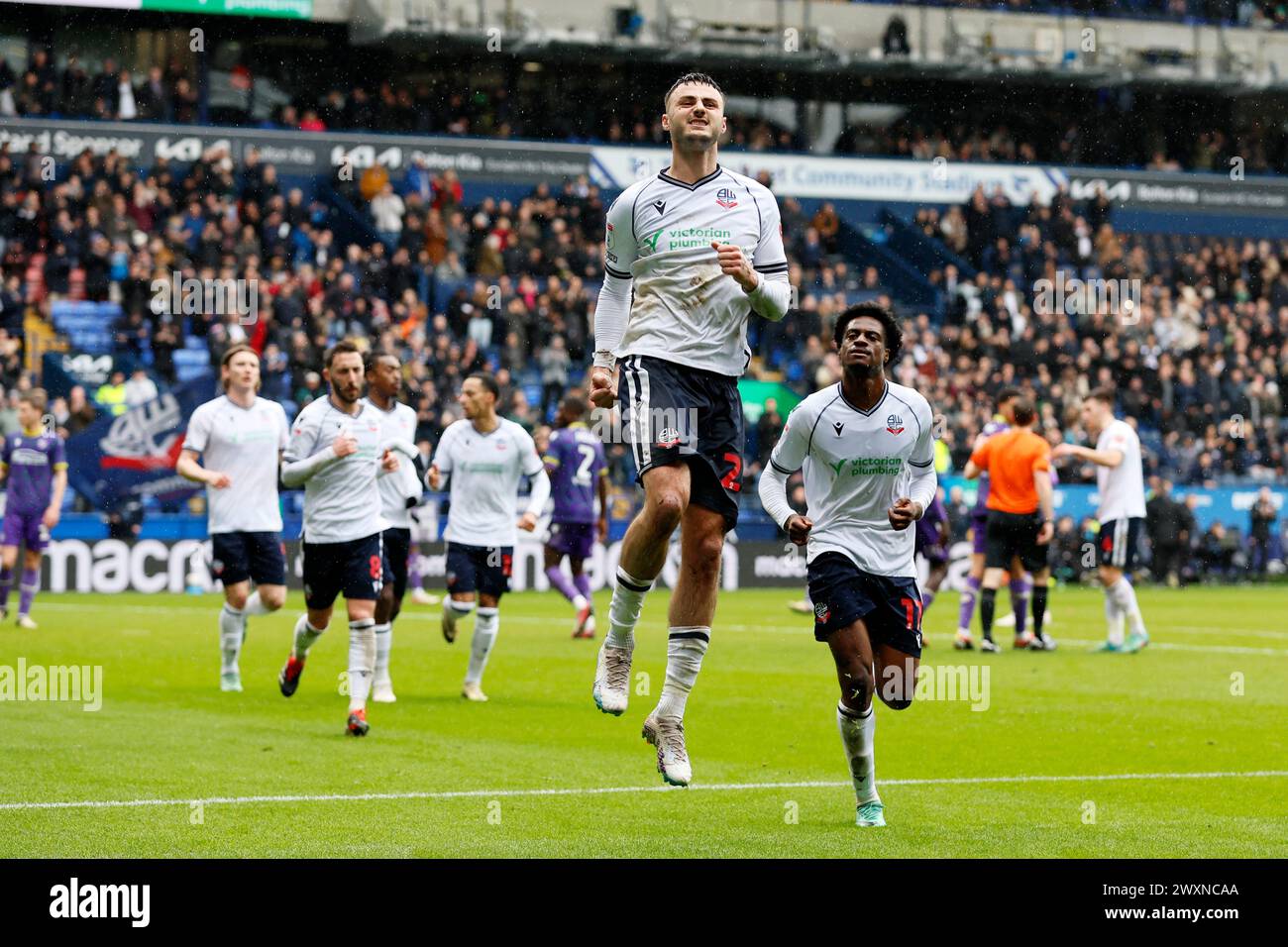 Bolton Wanderers' Aaron Collins celebrates scoring their side's second ...