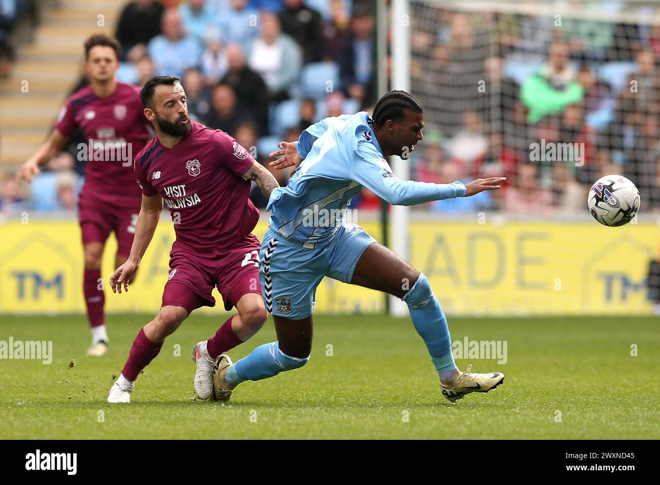 Coventry City's Haji Wright (right) and Cardiff City's Manolis Siopis ...