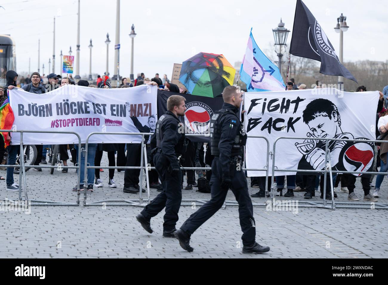 Dresden, Germany. 01st Apr, 2024. Counter-demonstrators stand on the ...