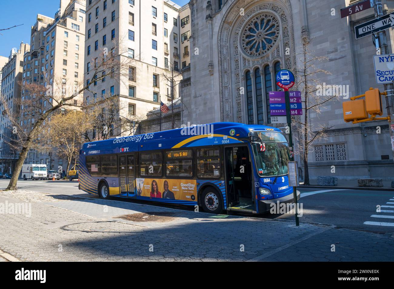 Clean energy hybrid bus on the streets of New York Stock Photo - Alamy