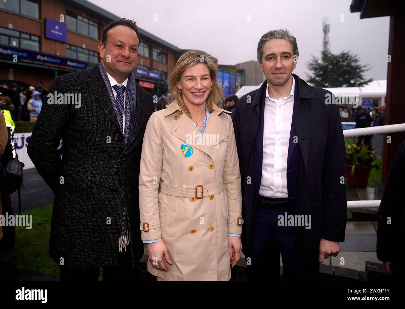 Taoiseach Leo Varadkar, Fine Gael leader Simon Harris (right) and ...