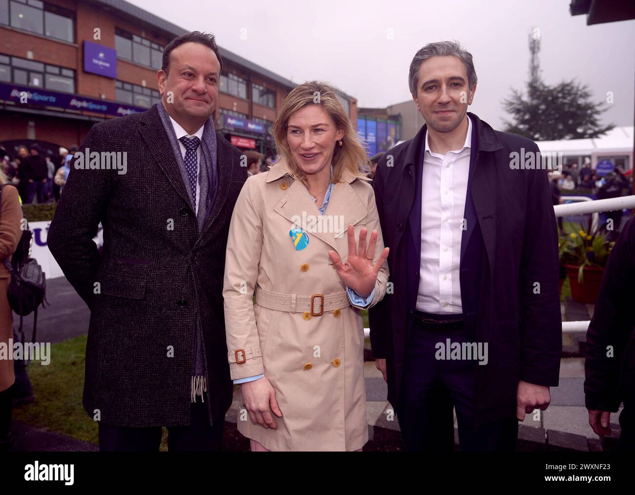 Taoiseach Leo Varadkar, Fine Gael leader Simon Harris (right) and ...