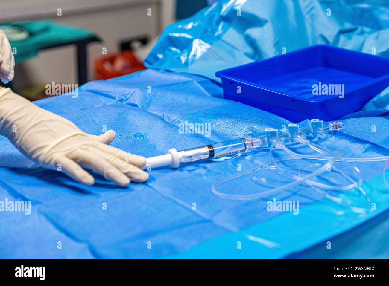 The procedure of inserting a double lumen catheter into a patient with ...