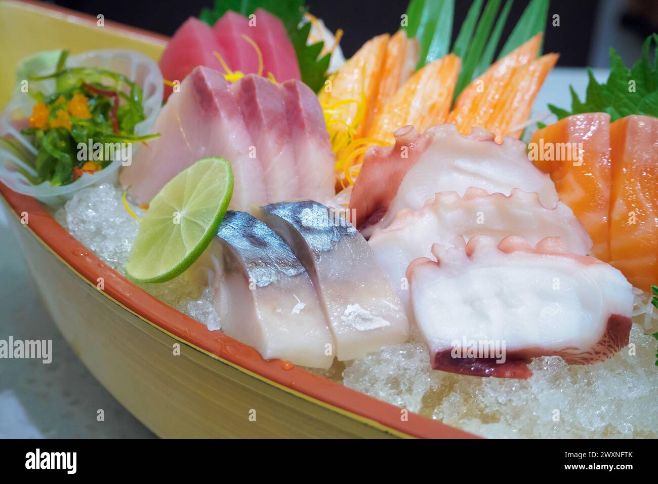 japanese sashimi set on boat plate Stock Photo - Alamy