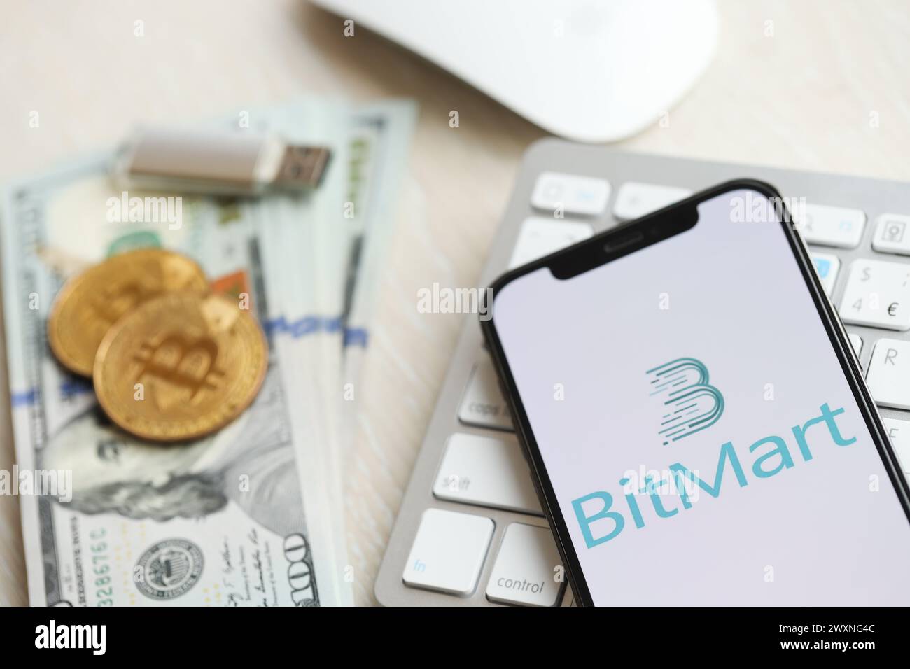 KYIV, UKRAINE - MARCH 15, 2024 Bitmart logo on iPhone display screen on ...