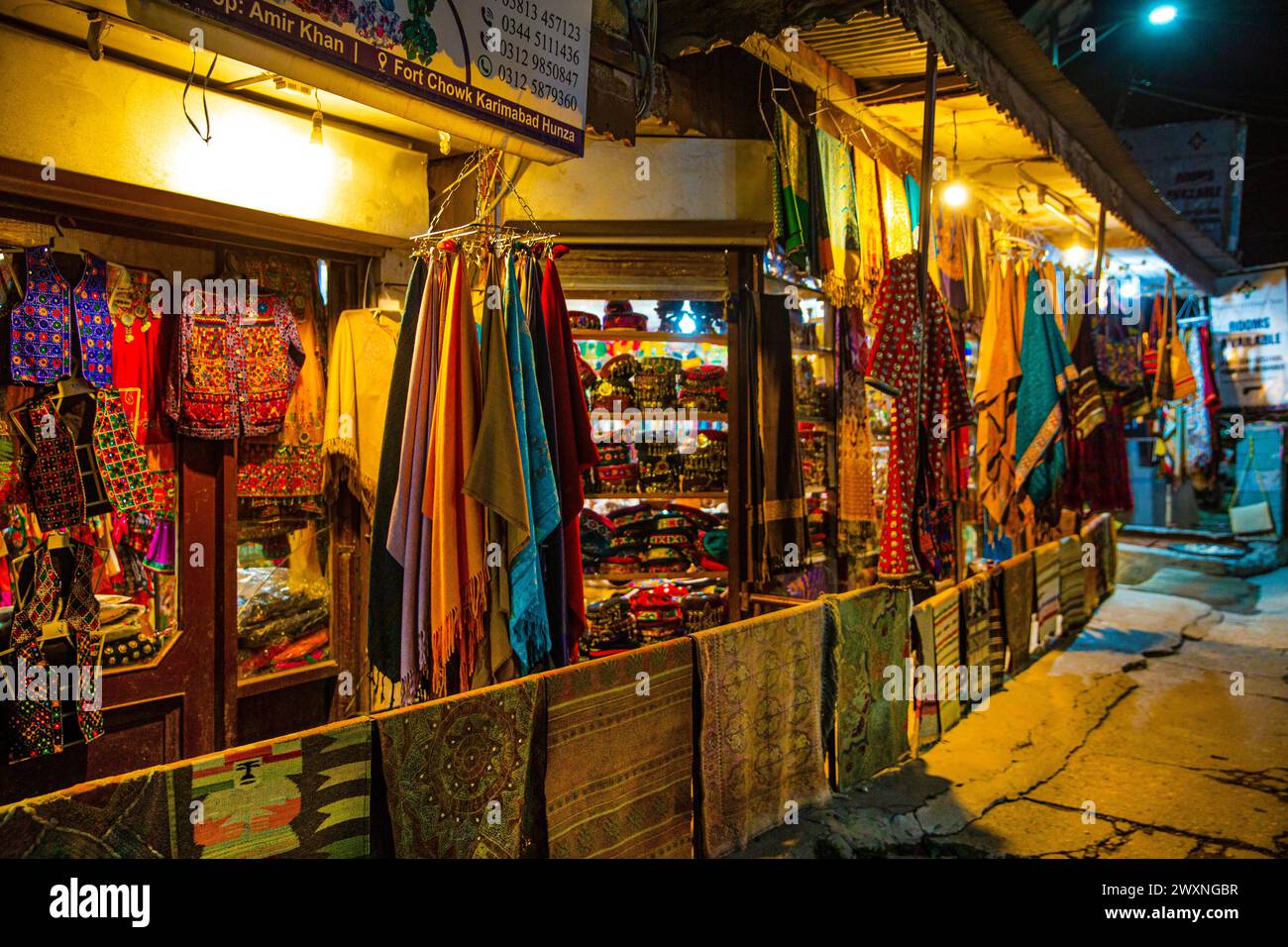 28 September 2023, Karimabad, Pakistan. Night illuminated street with ...