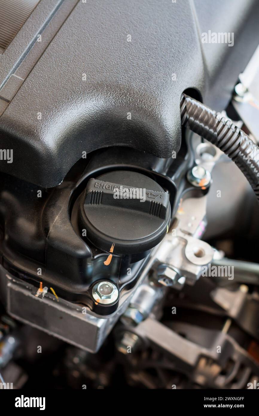 closeup engine oil cap in car engine Stock Photo - Alamy