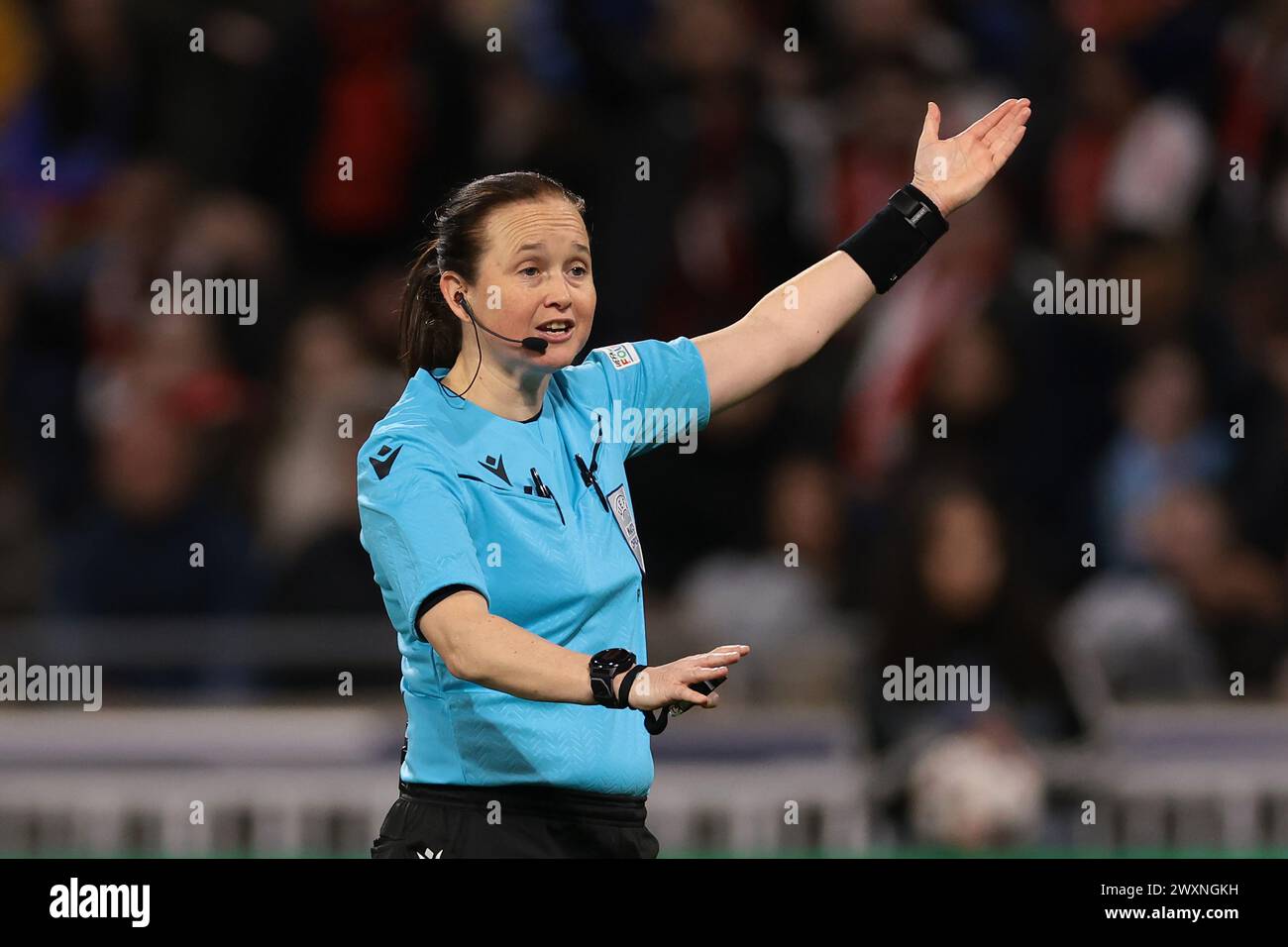 Lyon, France. 27th Mar, 2024. The Referee Cheryl Foster of Wales reacts ...