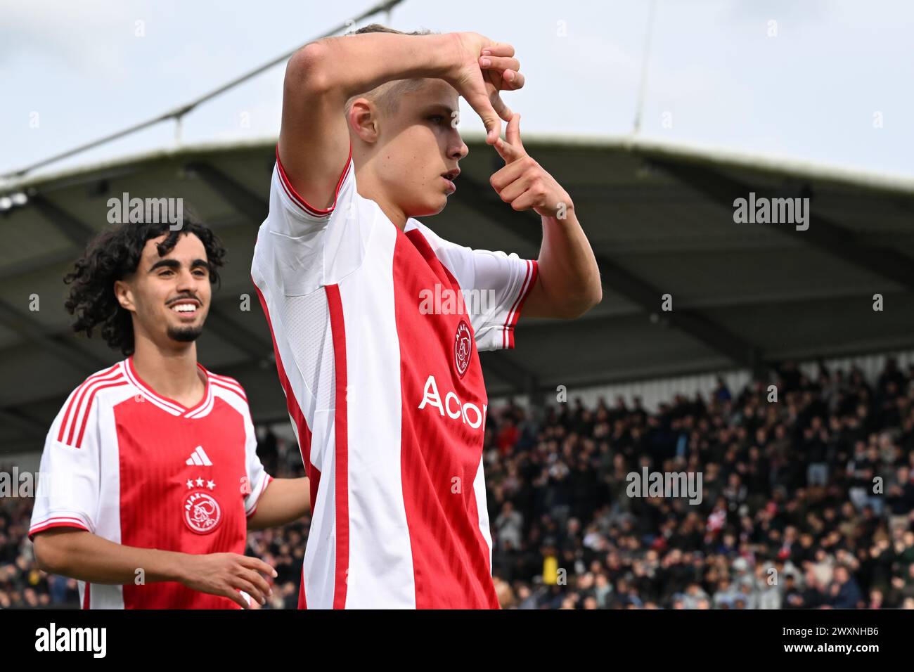 AMSTERDAM - Sean Steur of Ajax U17 celebrates his winning goal during ...