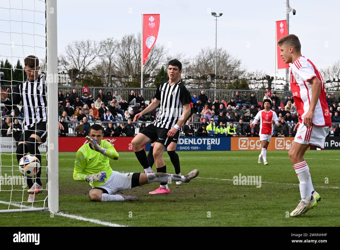 AMSTERDAM - Sean Steur of Ajax U17 (r) scores during the final Ajax ...
