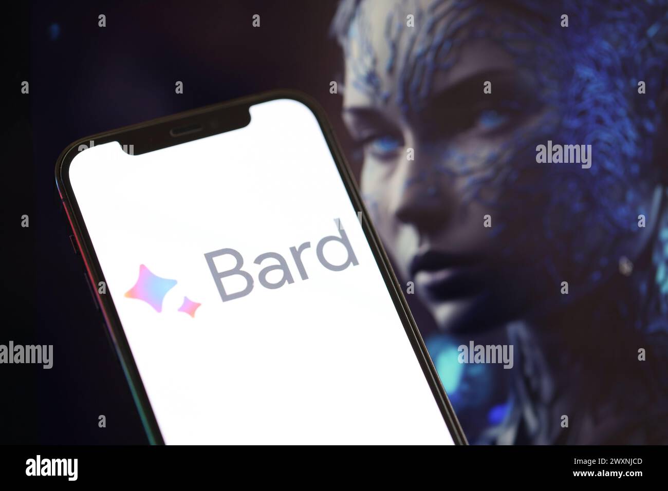 KYIV, UKRAINE - MARCH 17, 2024 Google Bard logo on iPhone display screen with background of ...