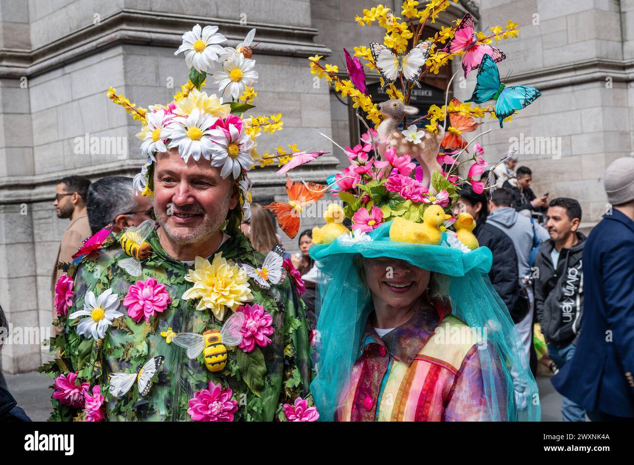 New York, New York, USA, 31 March 2024. Revelers stroll and pose along ...
