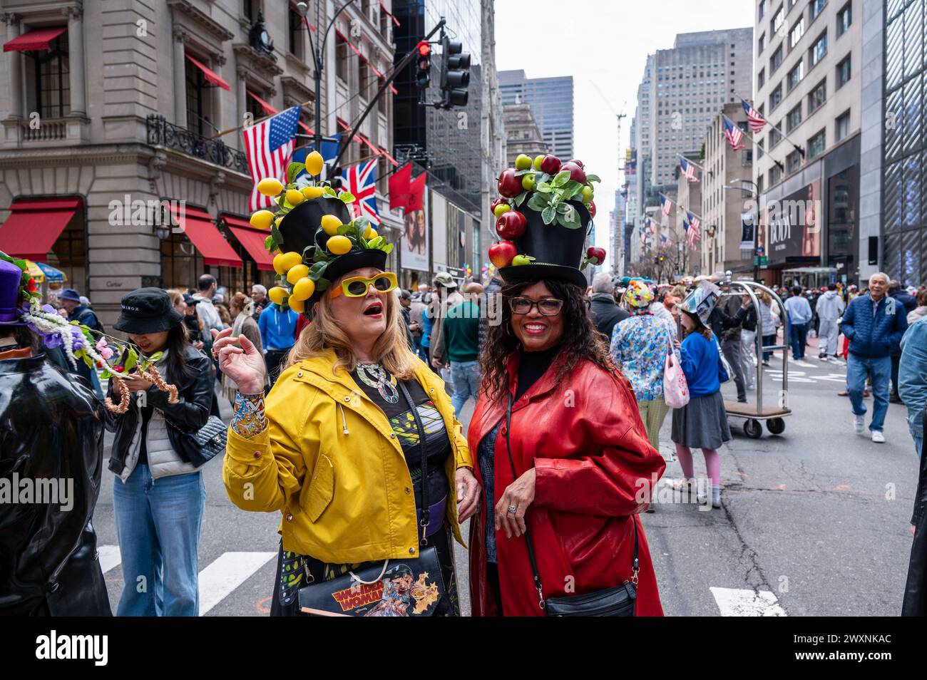 New York, New York, USA, 31 March 2024. Revelers stroll and pose along ...