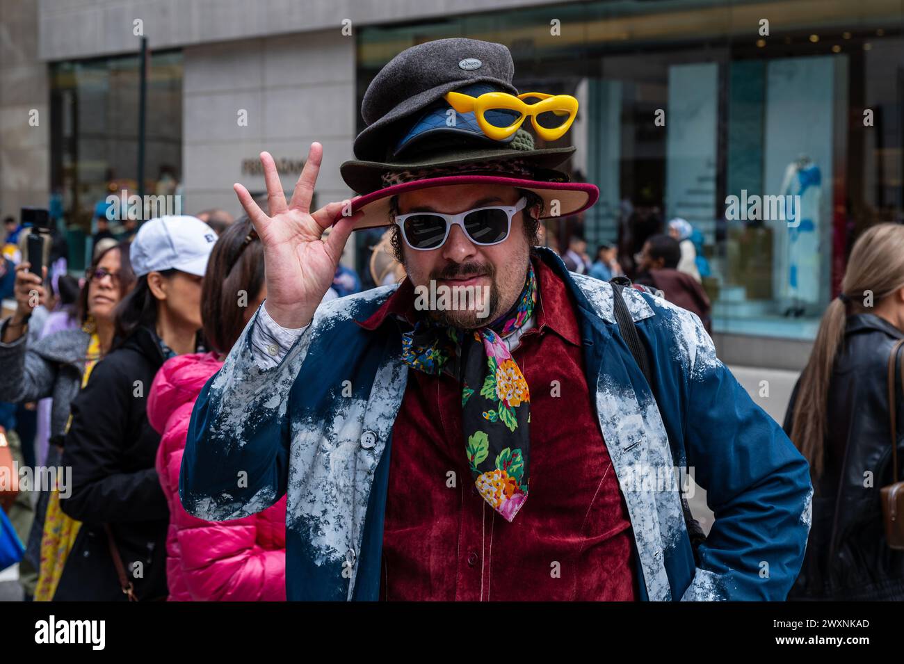 New York, New York, USA, 31 March 2024. Revelers stroll and pose along ...