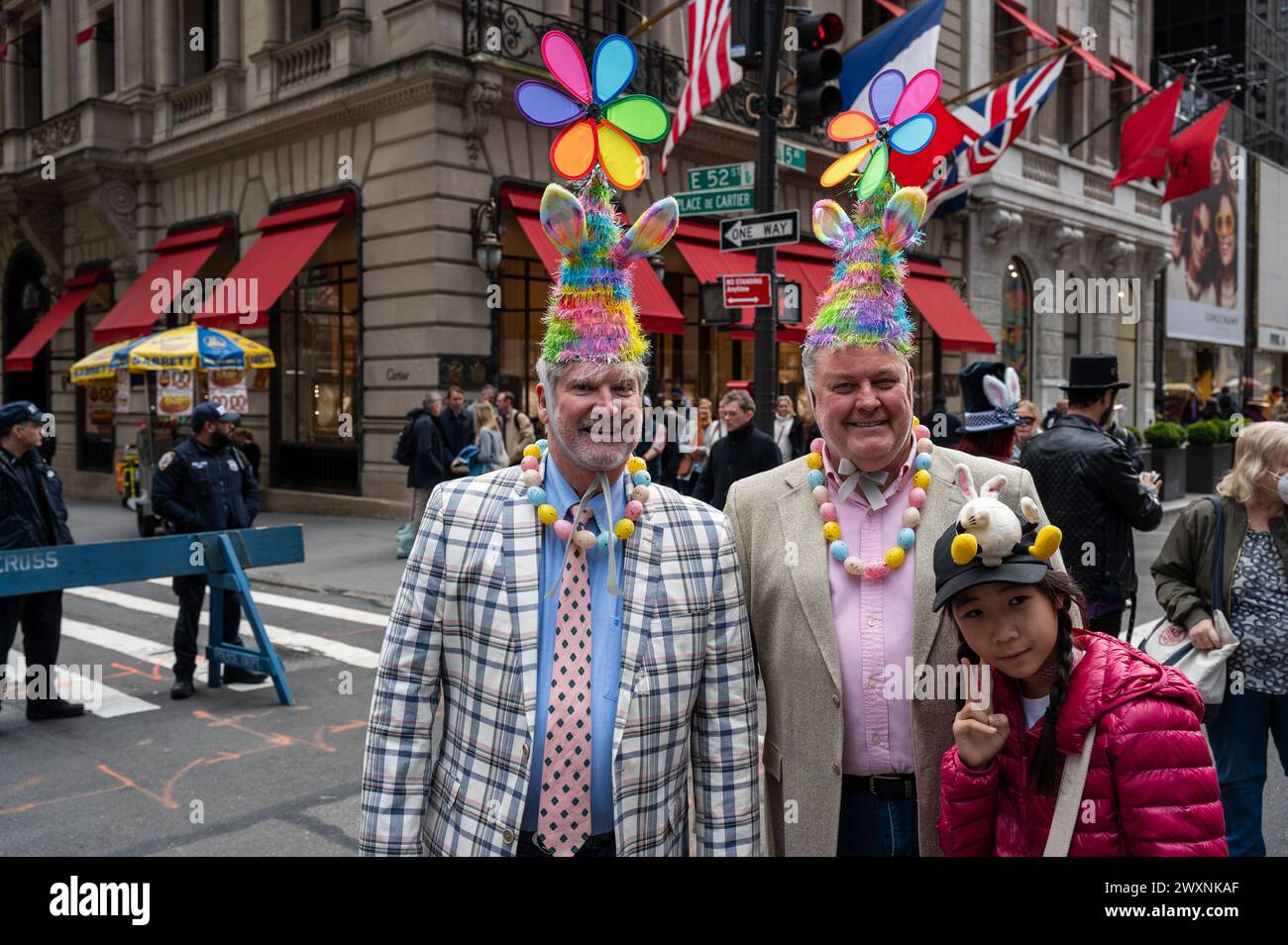 New York, New York, USA, 31 March 2024. Revelers stroll and pose along ...